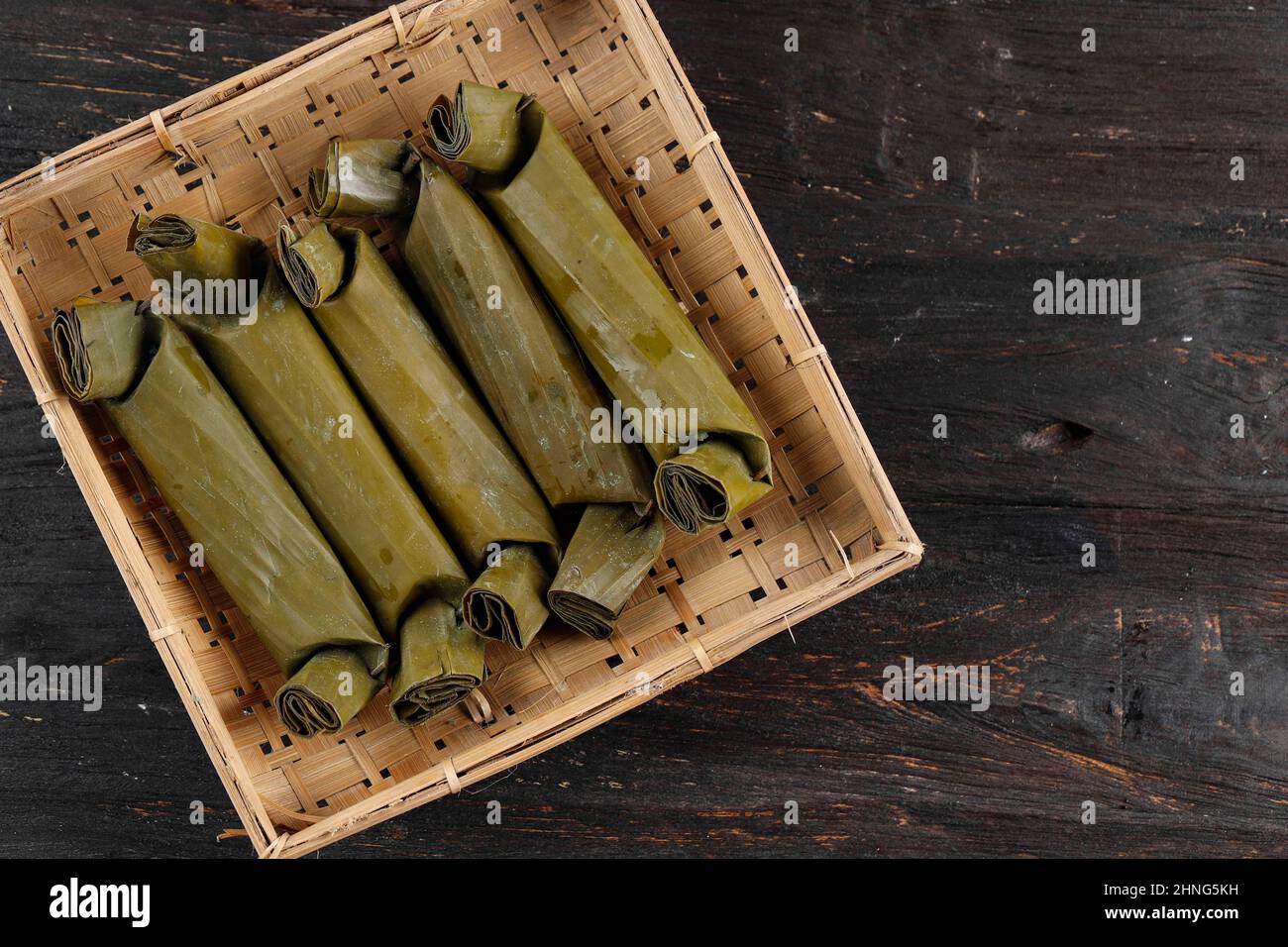 Lontong, Indonesian Compressed Rice Cake with Cylinder Shape, Wrapped ...
