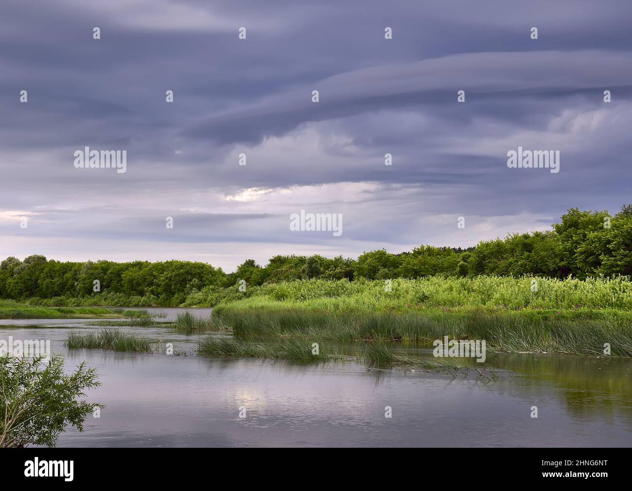 Dramatic landscape on the Yin River with a crow in the clouds ...