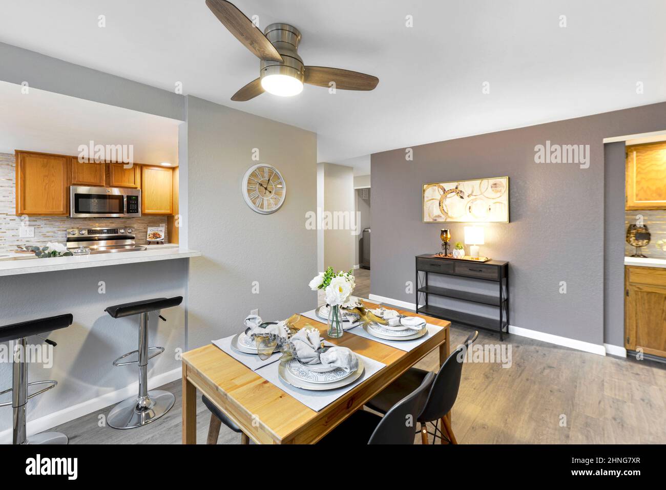 Modern residential dining room and kitchen interior Stock Photo - Alamy