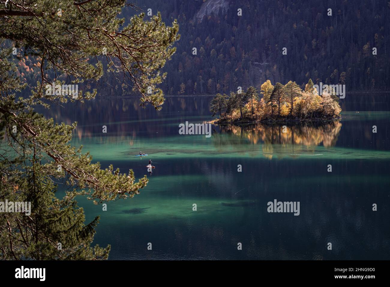 Landscape of the Elbsee surrounded by hills and greenery in Bavaria ...