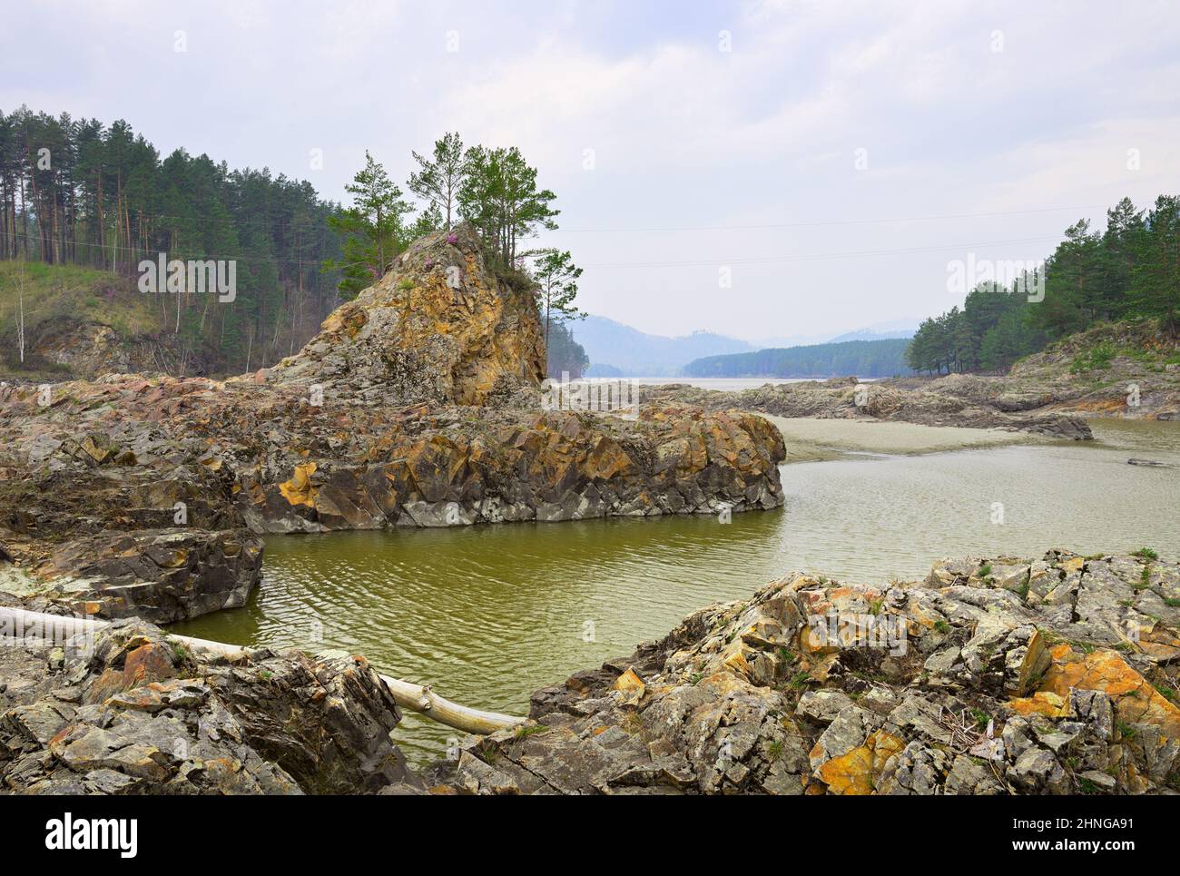Manzherok rapids in the Altai Mountains. Stone island in the middle of ...