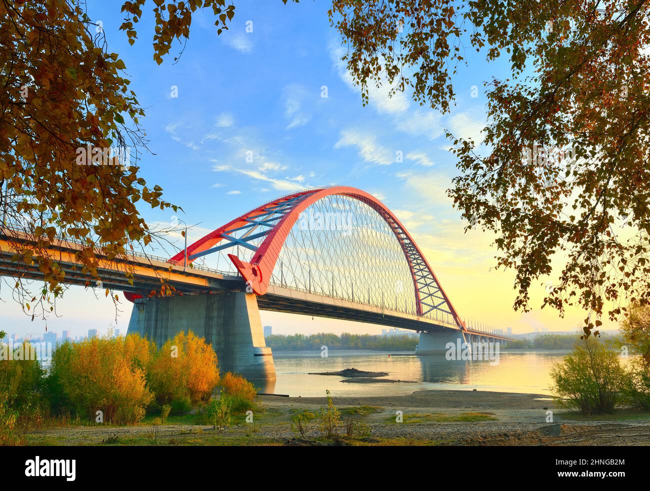 Bugrinsky bridge in golden autumn. Arched automobile bridge on the ...