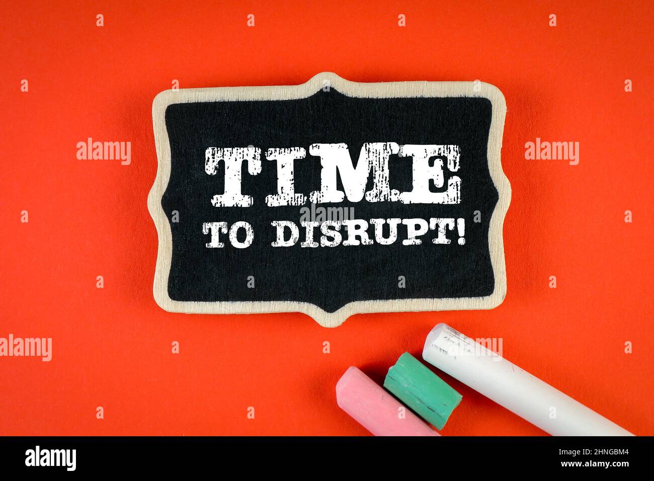 Time to Disrupt. Miniature chalk board on a red background Stock Photo ...
