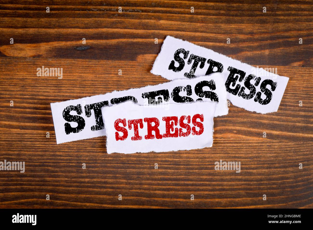 Stress. Paper sticky notes with text on a wooden texture background ...