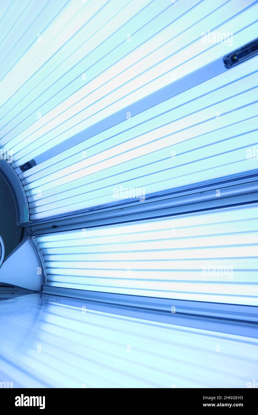 Modern sunbed in beauty salon Stock Photo - Alamy