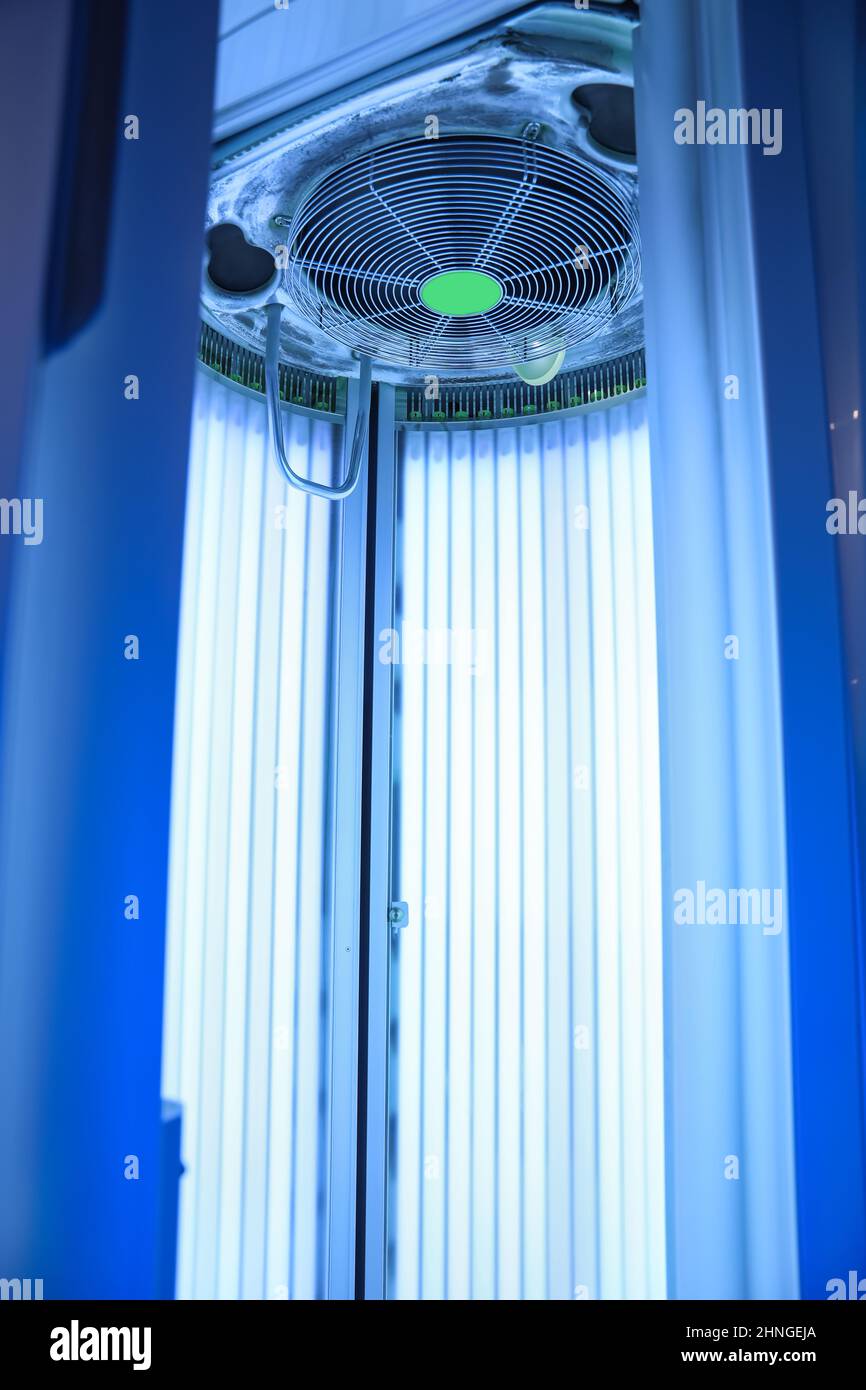 Modern solarium in beauty salon Stock Photo - Alamy