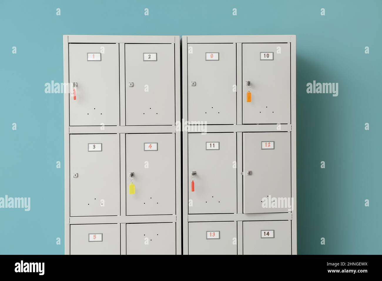 Modern locker near blue wall Stock Photo - Alamy