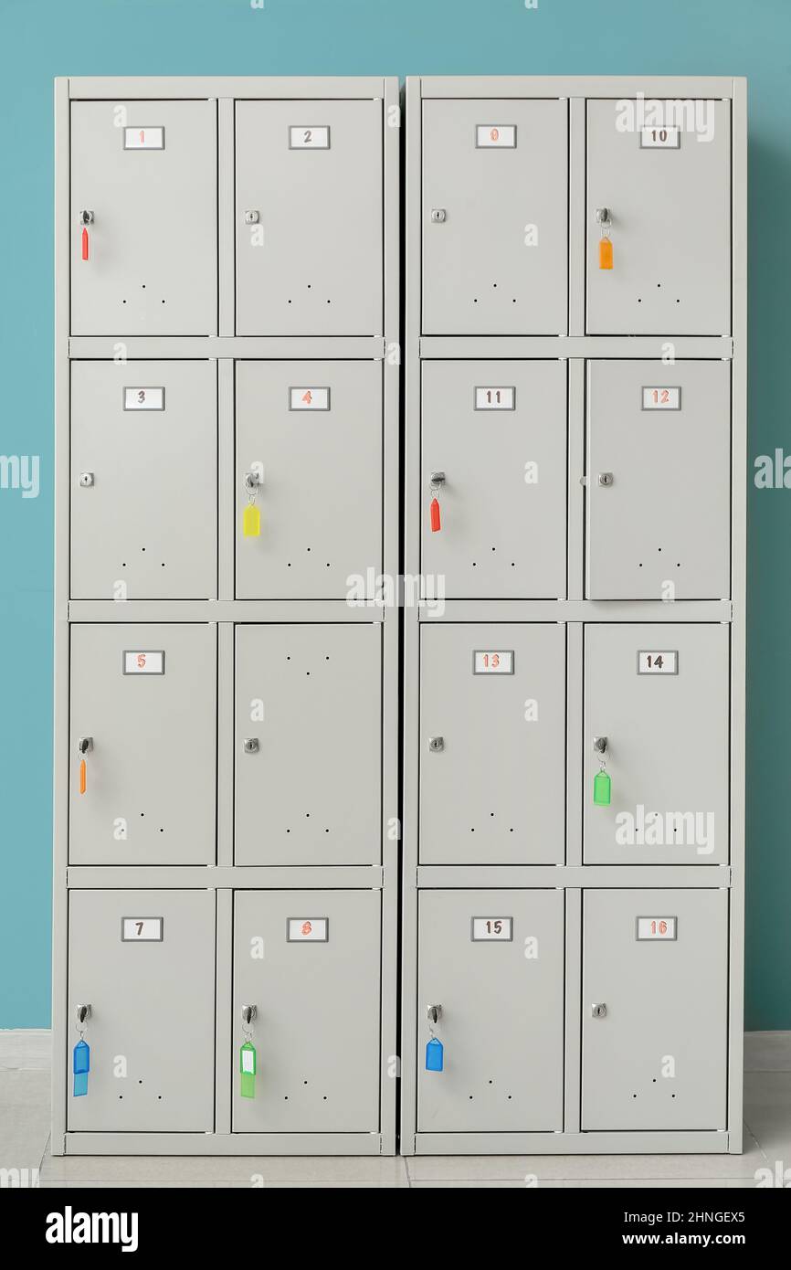 Modern locker near blue wall Stock Photo - Alamy