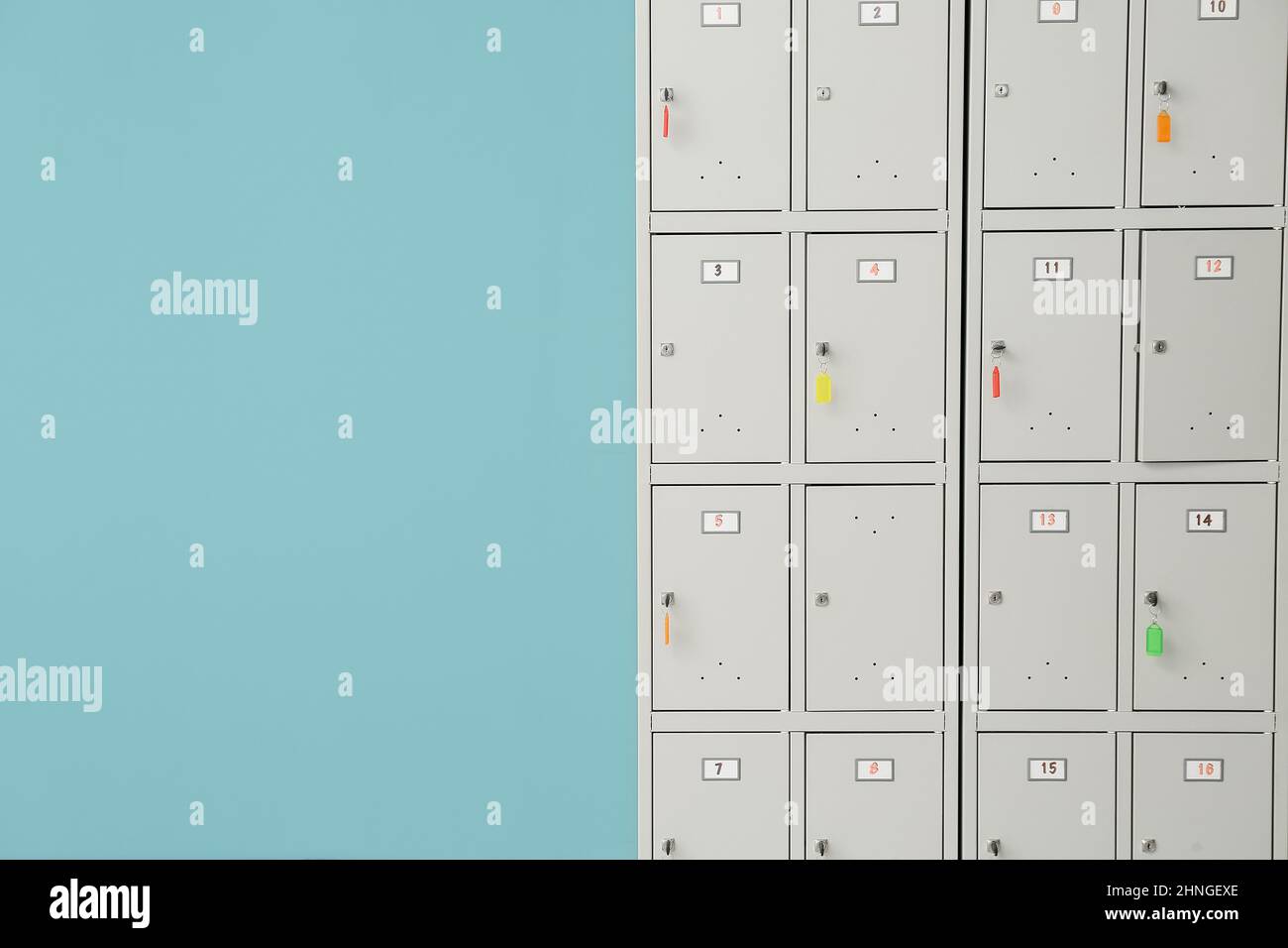 Modern locker near blue wall Stock Photo - Alamy