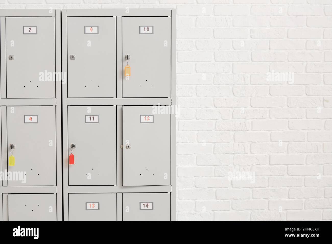 Modern locker near white wall Stock Photo - Alamy
