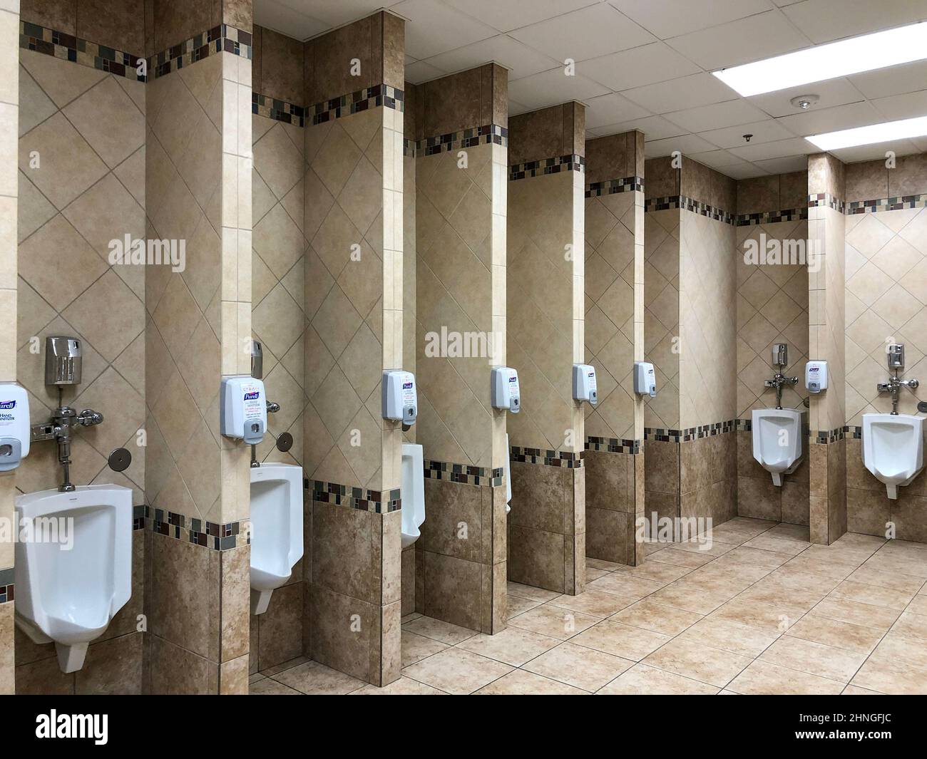 NEW BRAUNFELS, TX - 22 FEB 2020: Urinals and Purell hand sanitizer ...