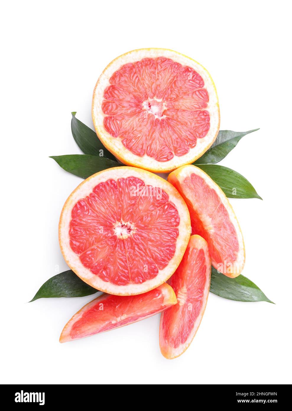 Fresh grapefruit pieces on white background Stock Photo - Alamy