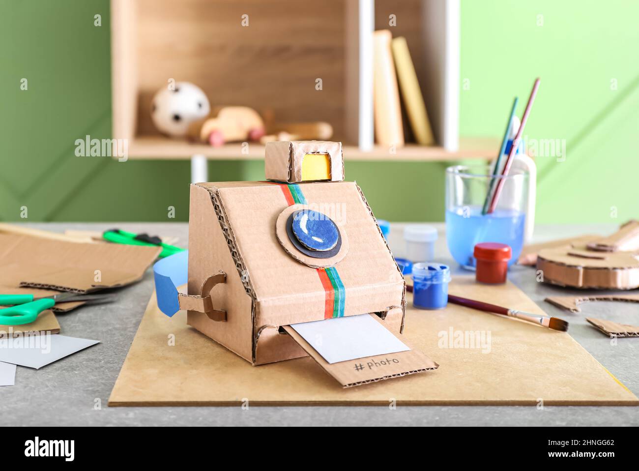 Child paints cardboard toy hi-res stock photography and images - Alamy