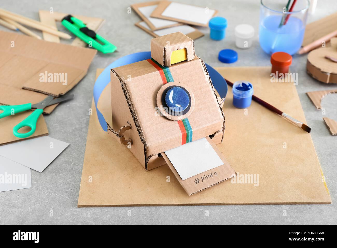 Child paints cardboard toy hi-res stock photography and images - Alamy