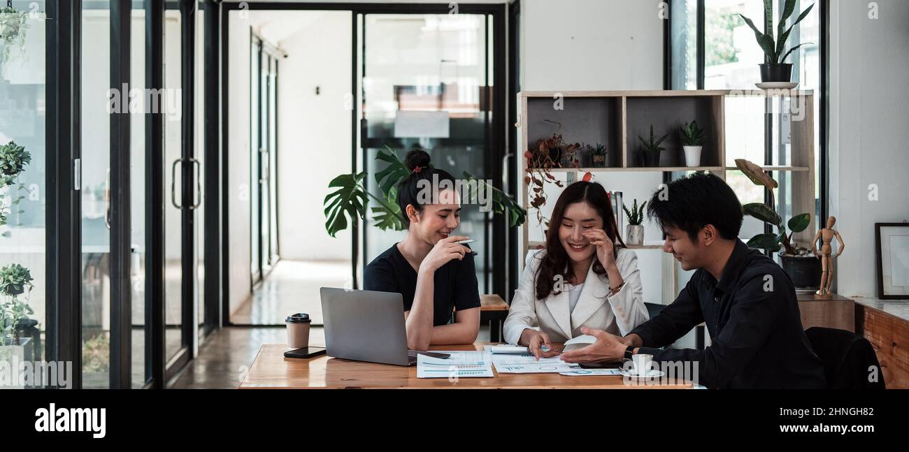 Young asian business group with the creative work, talk and exchange ...