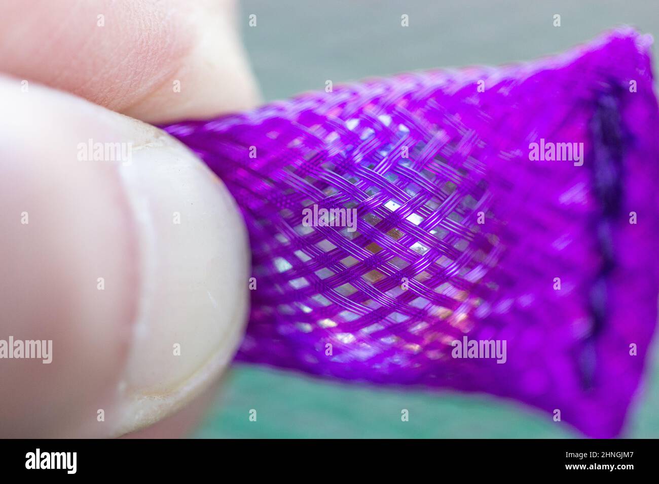 Purple Fidget Toy Helps Relieve Stress and Anxiety Stock Photo - Alamy