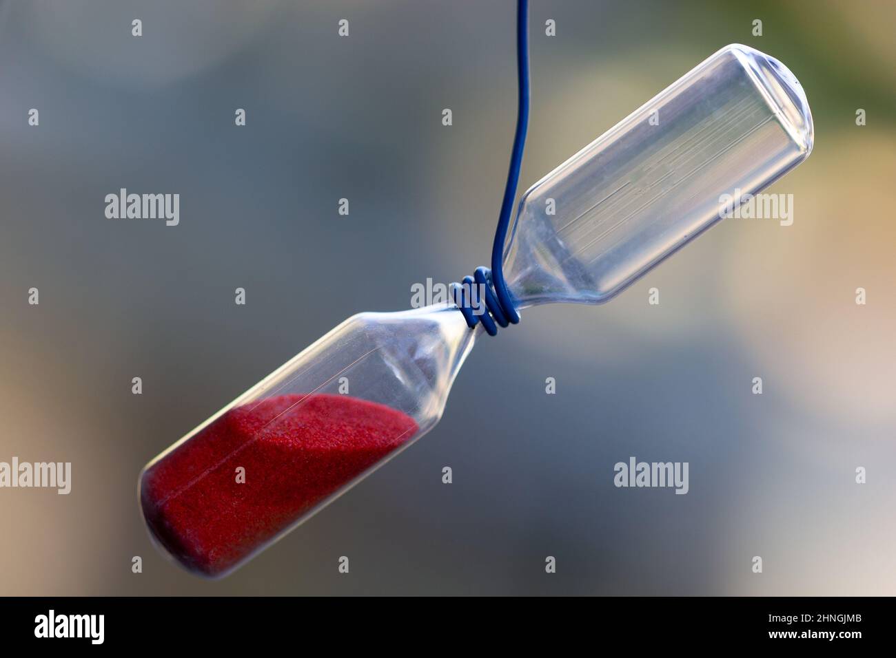 Time-Defying Hourglass Suspended in Mid-Air Stock Photo - Alamy