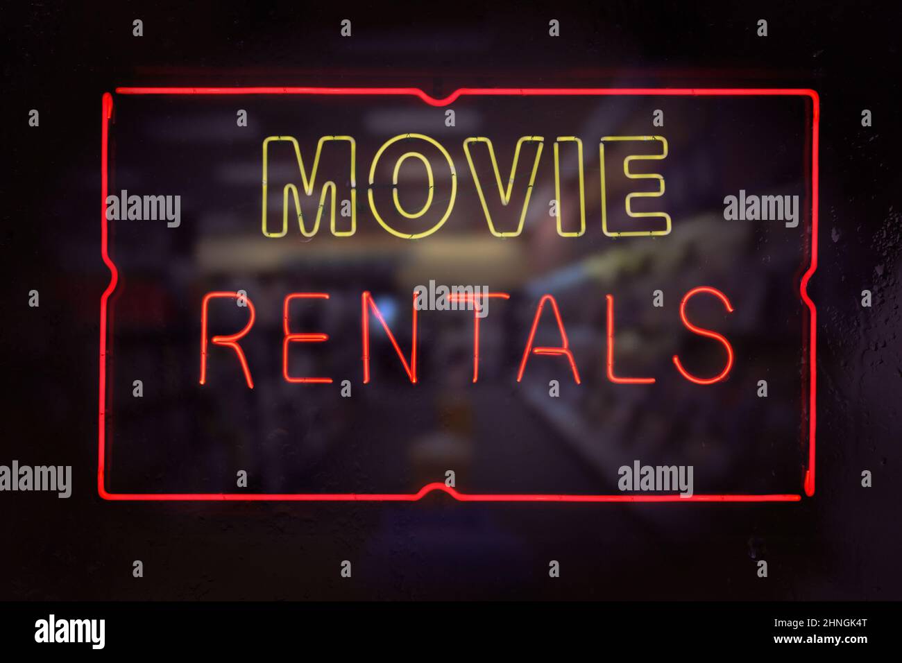 Neon Movie Rentals Sign in Rainy Window Stock Photo - Alamy