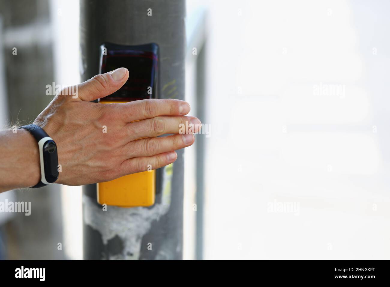 Pedestrian presses button in hi-res stock photography and images - Alamy