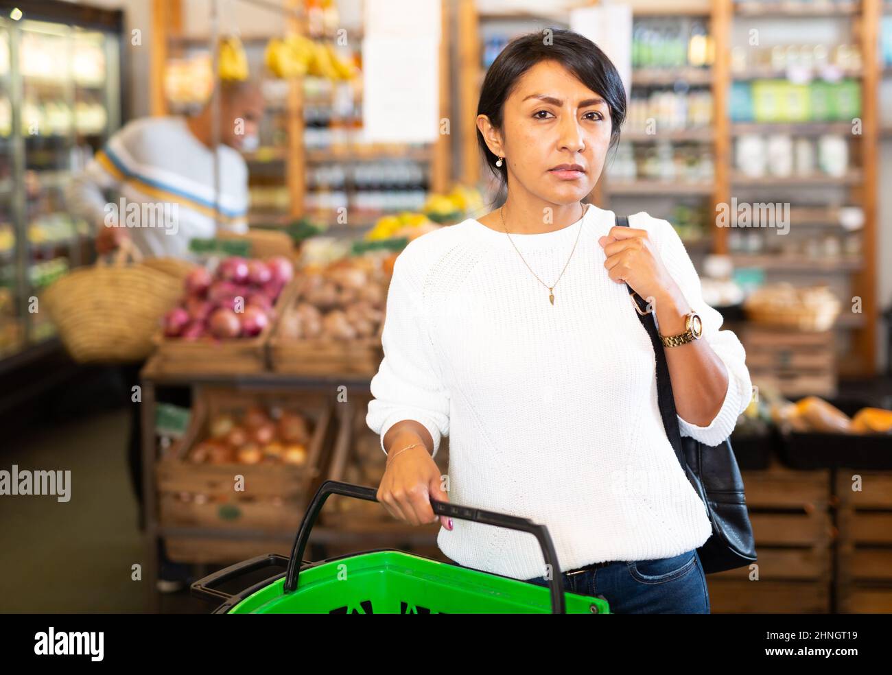 Latin american woman shopping in food department of supermarket Stock ...