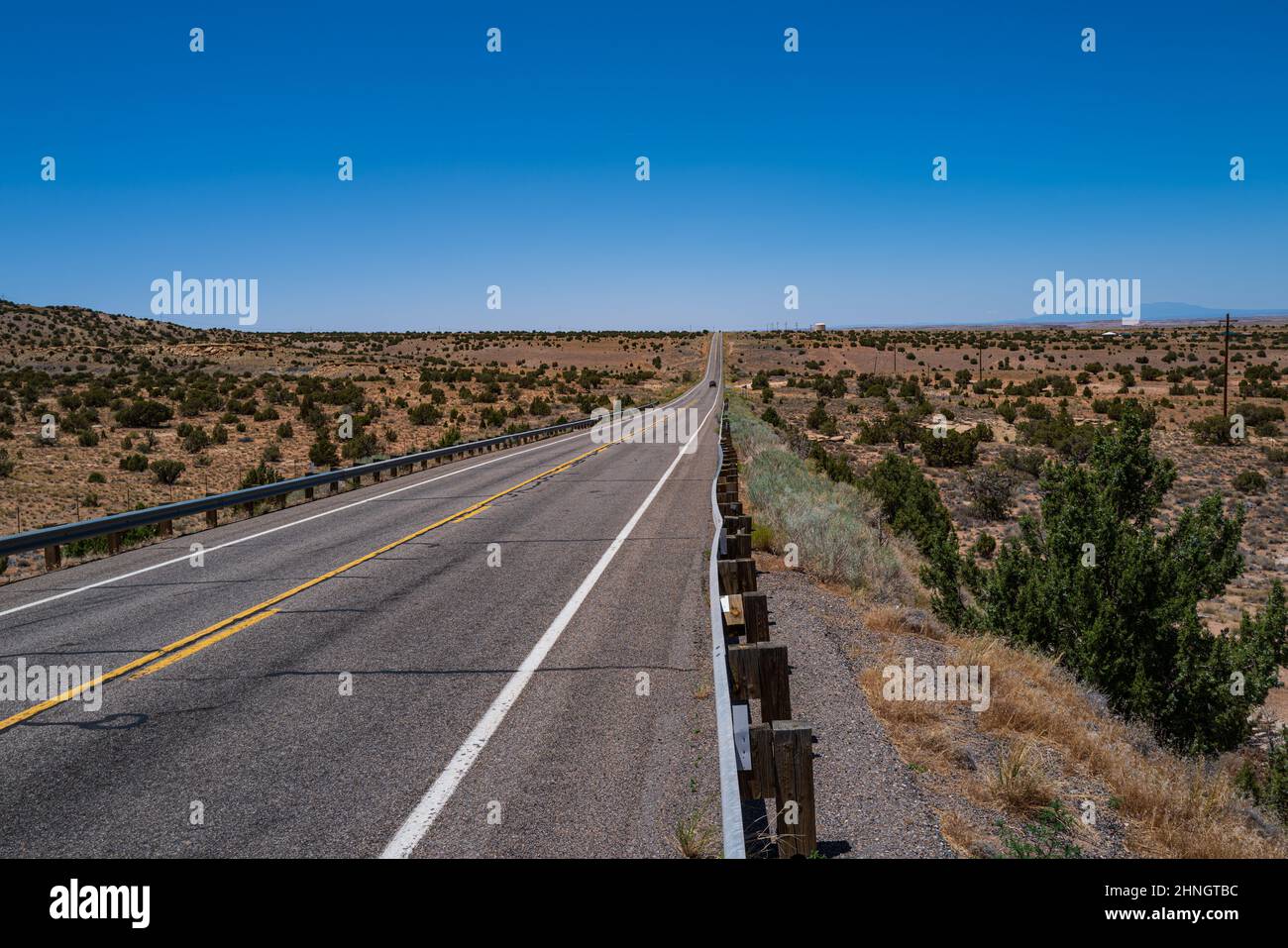 Panoramic picture of a scenic road, USA. Barren scenery Stock Photo - Alamy