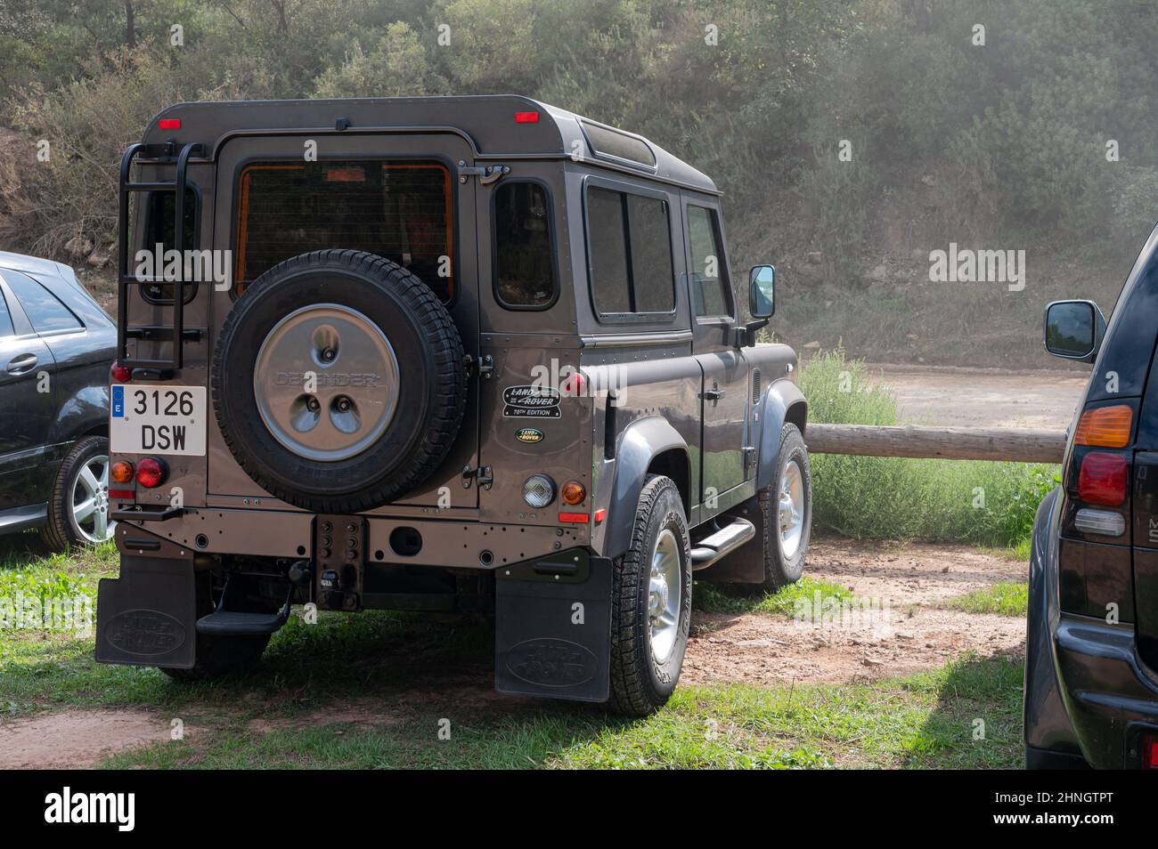 Land Rover Defender crawler in the field Stock Photo - Alamy