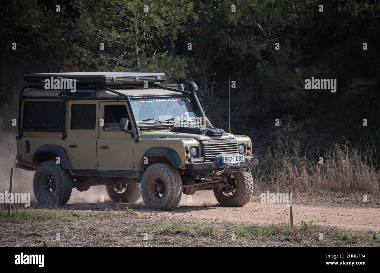 Land Rover Defender crawler in the field Stock Photo - Alamy