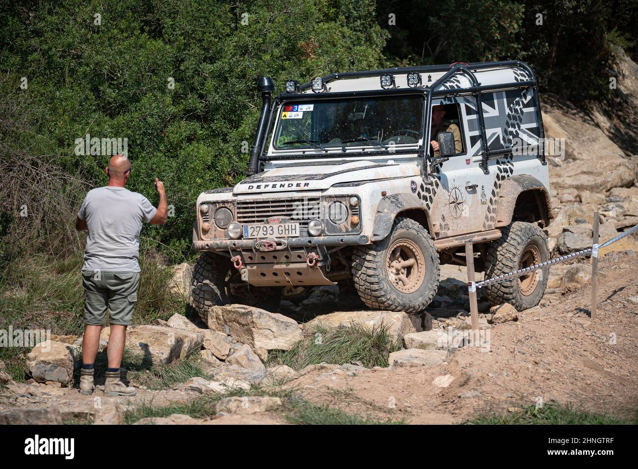 White Land Rover Defender in the field in Barcelona, Spain Stock Photo ...