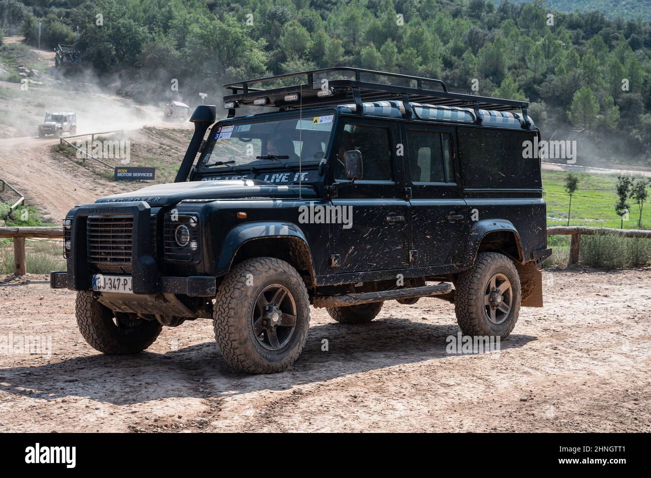 Land Rover Defender crawler in the field Stock Photo - Alamy