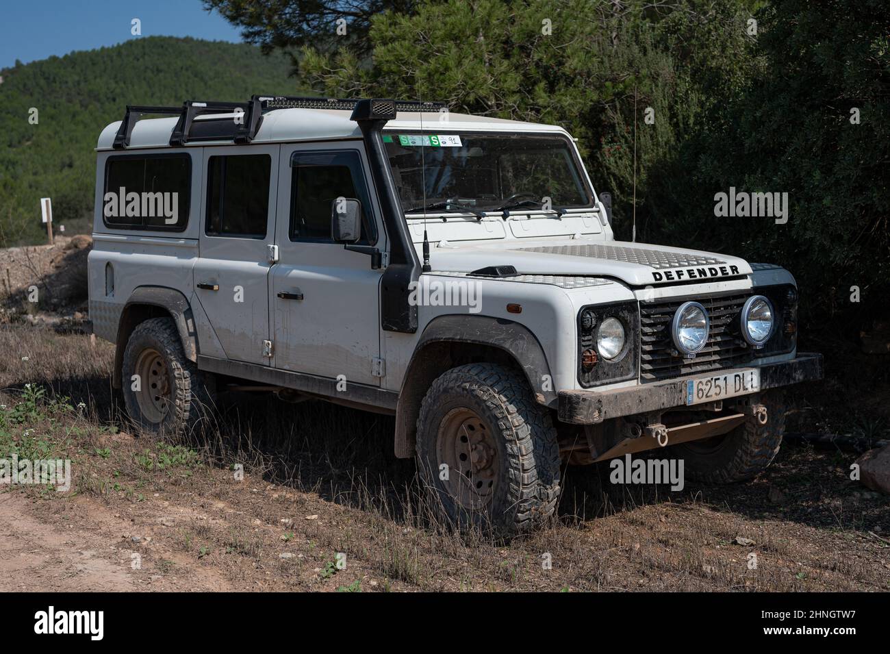 White Land Rover Defender in a wilderness Stock Photo - Alamy