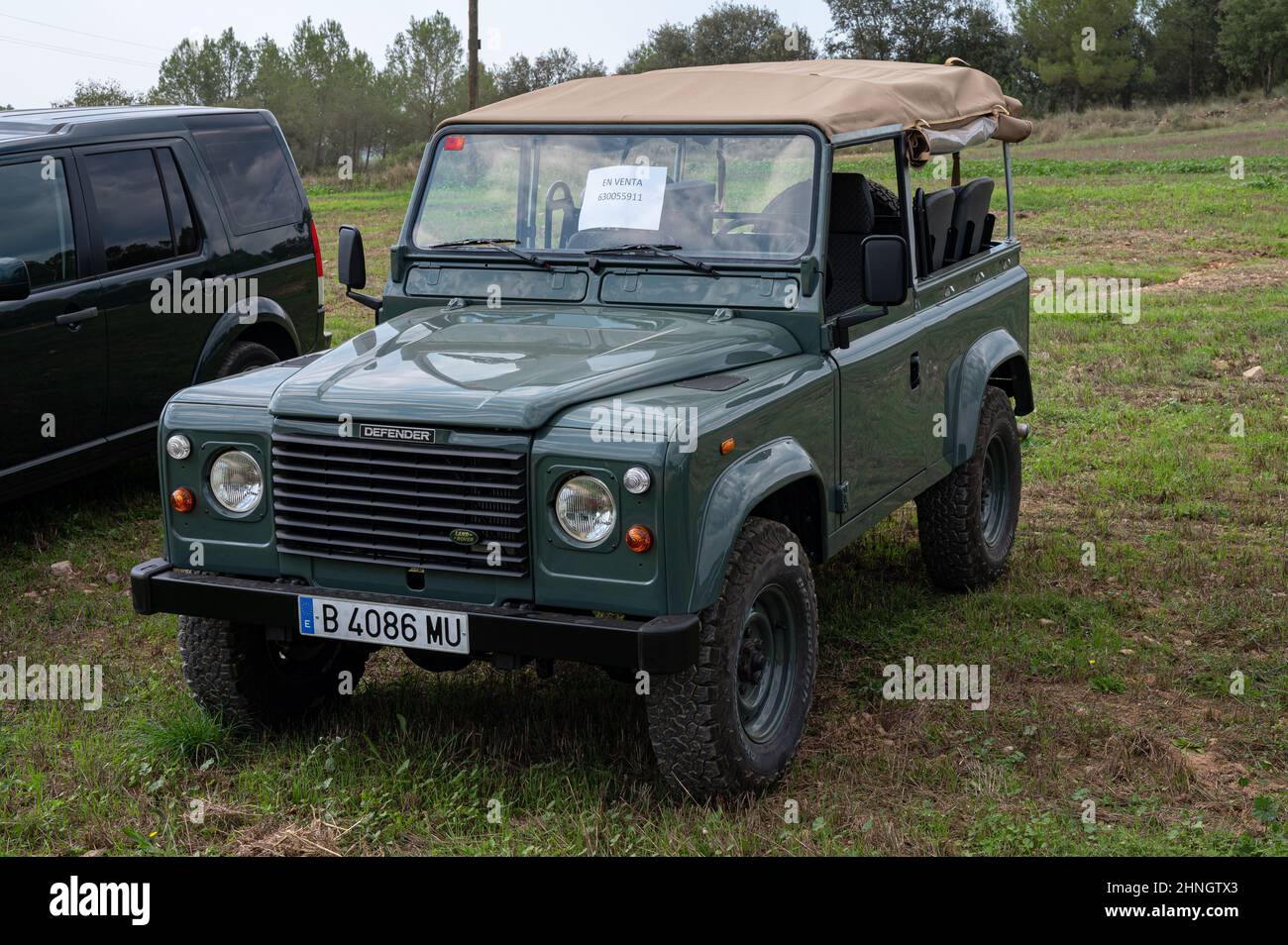 Land Rover Defender in the field Stock Photo - Alamy