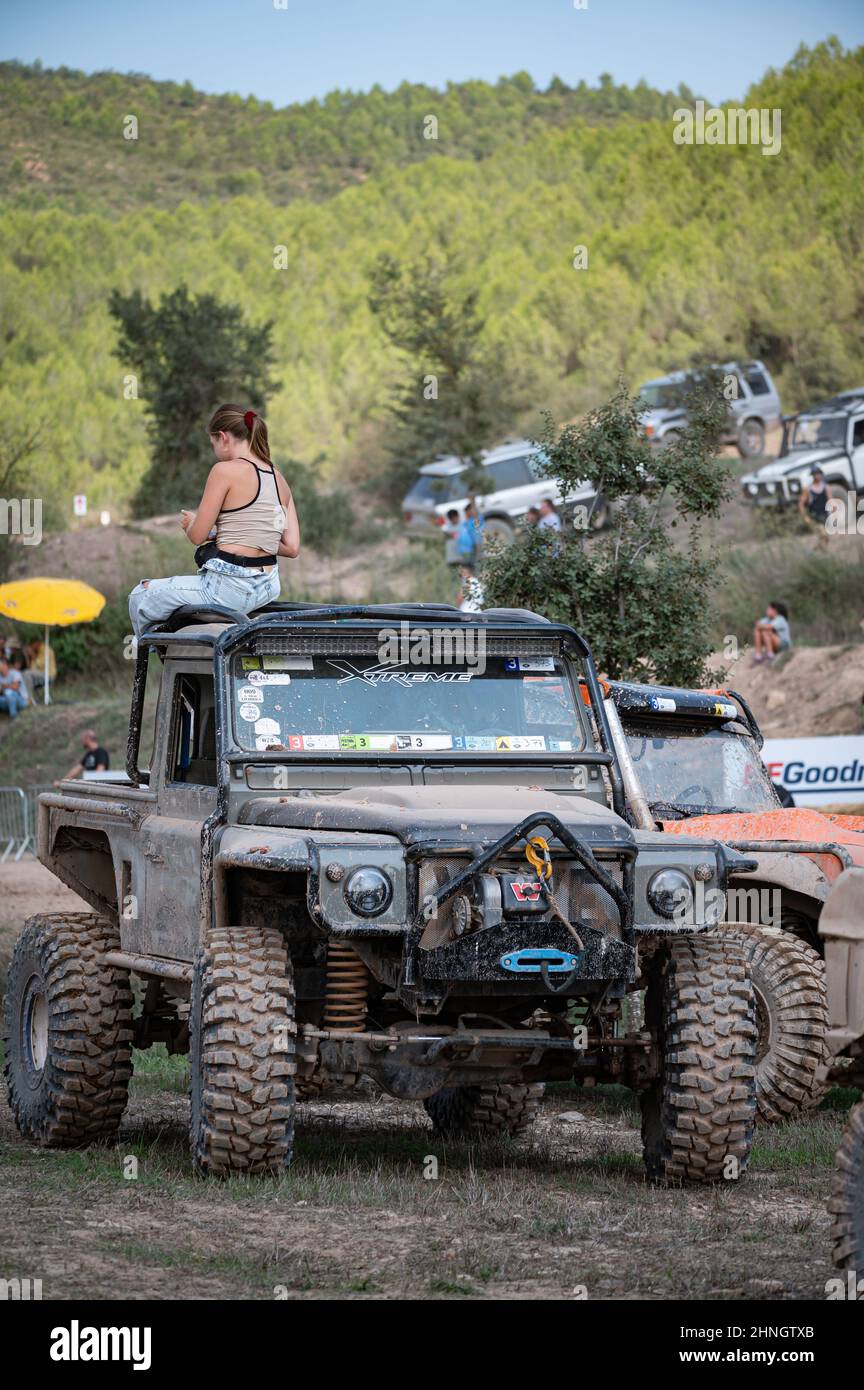 Young girl sitting on top of a modified Land Rover Defender Stock Photo ...