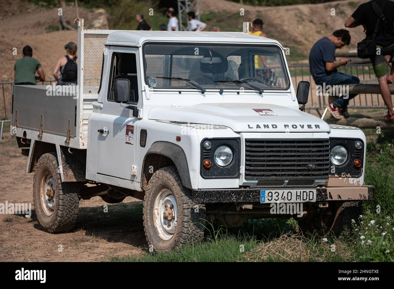 White Land Rover Defender in the field in Barcelona, Spain Stock Photo ...