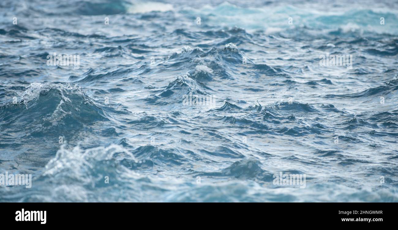 Calm sea water surface texture with splashes and waves. Abstract nature ...