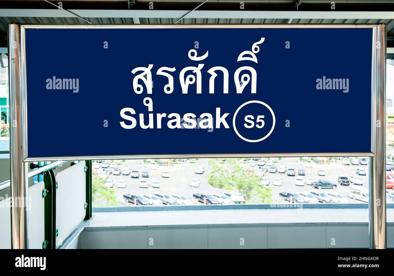 Sign in English and Thai languages at a train platform on the Bangkok BTS Skytrain Stock Photo ...