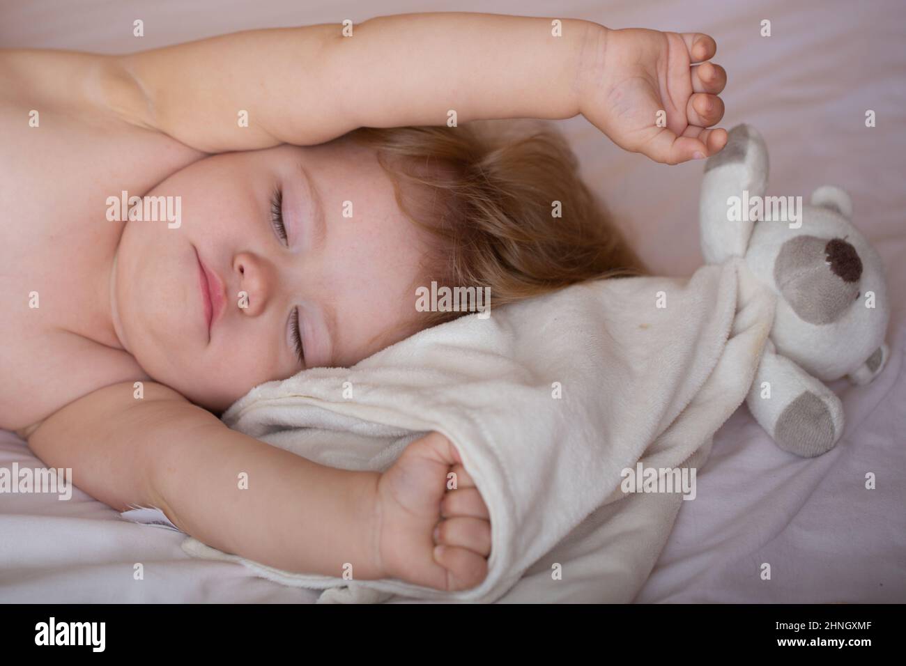Baby wake up in the bed. Healthy kids sleep Stock Photo - Alamy