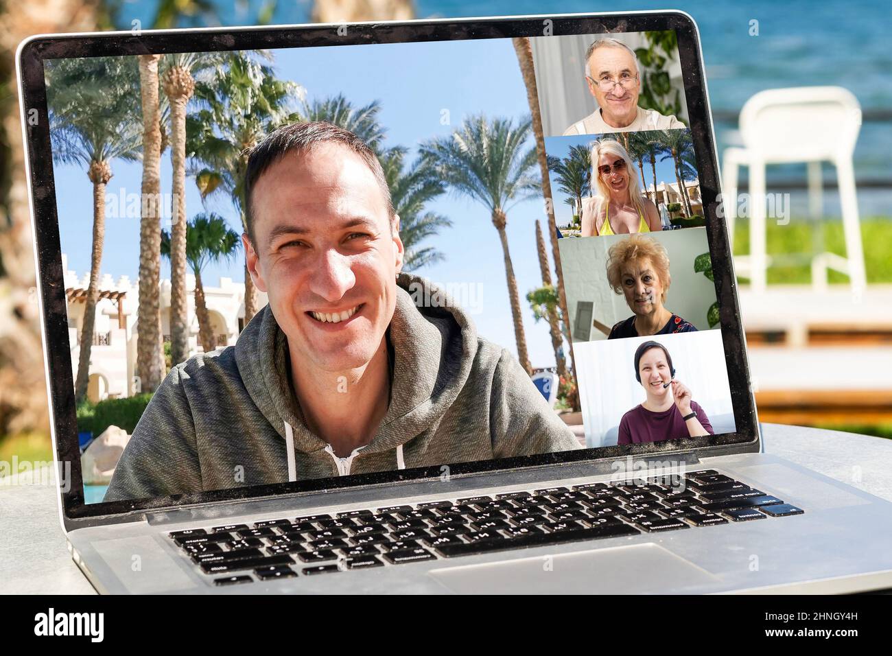 Zoom conference. Business partners communicate via video using laptop ...