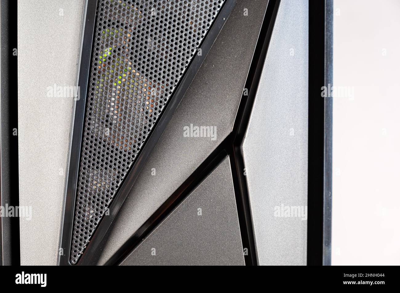 The front of a modern desktop computer. Black system unit in a ...