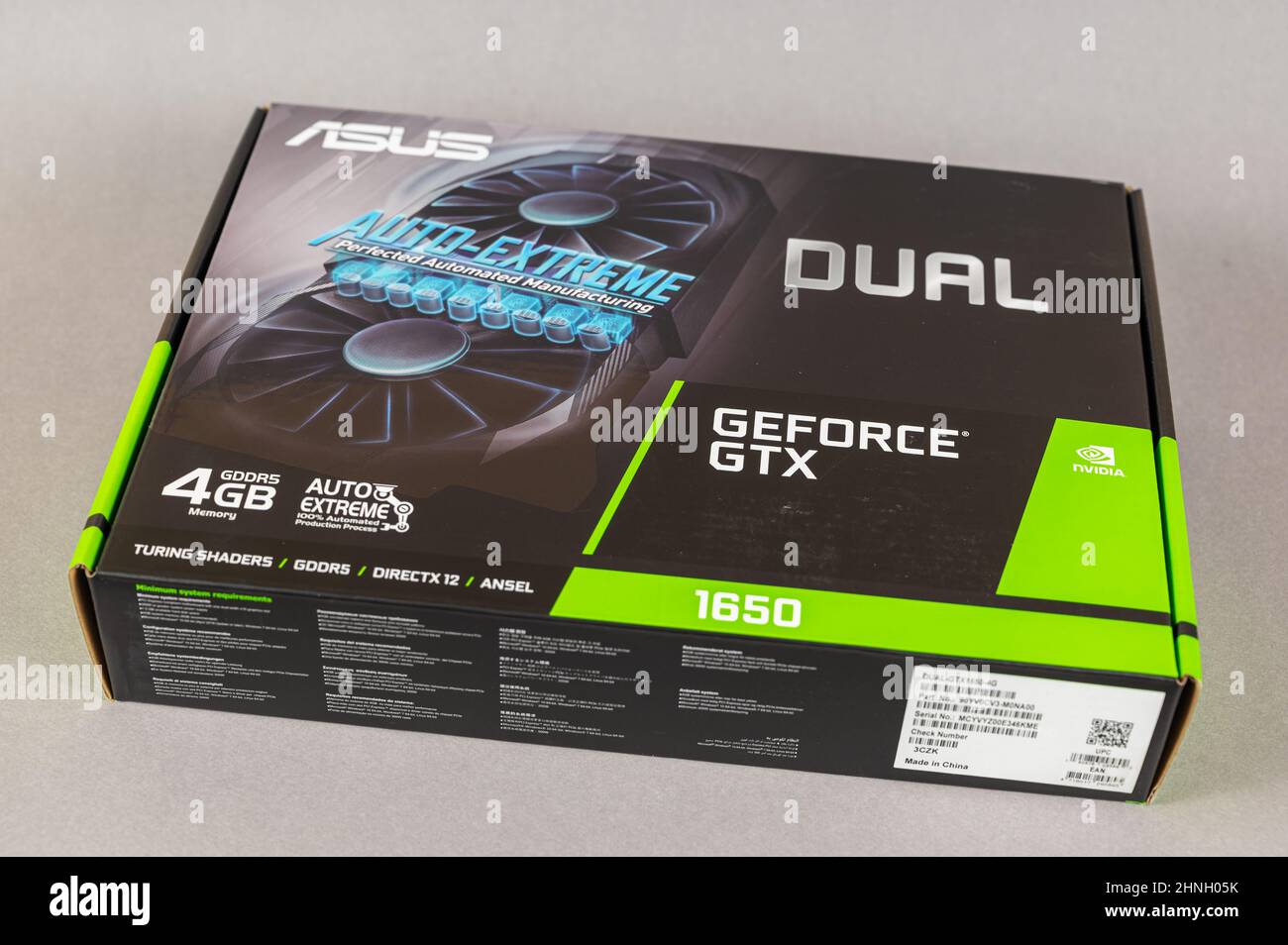 ASUS GFORCE GTX 1650 graphics card against a gray background. Modern ...