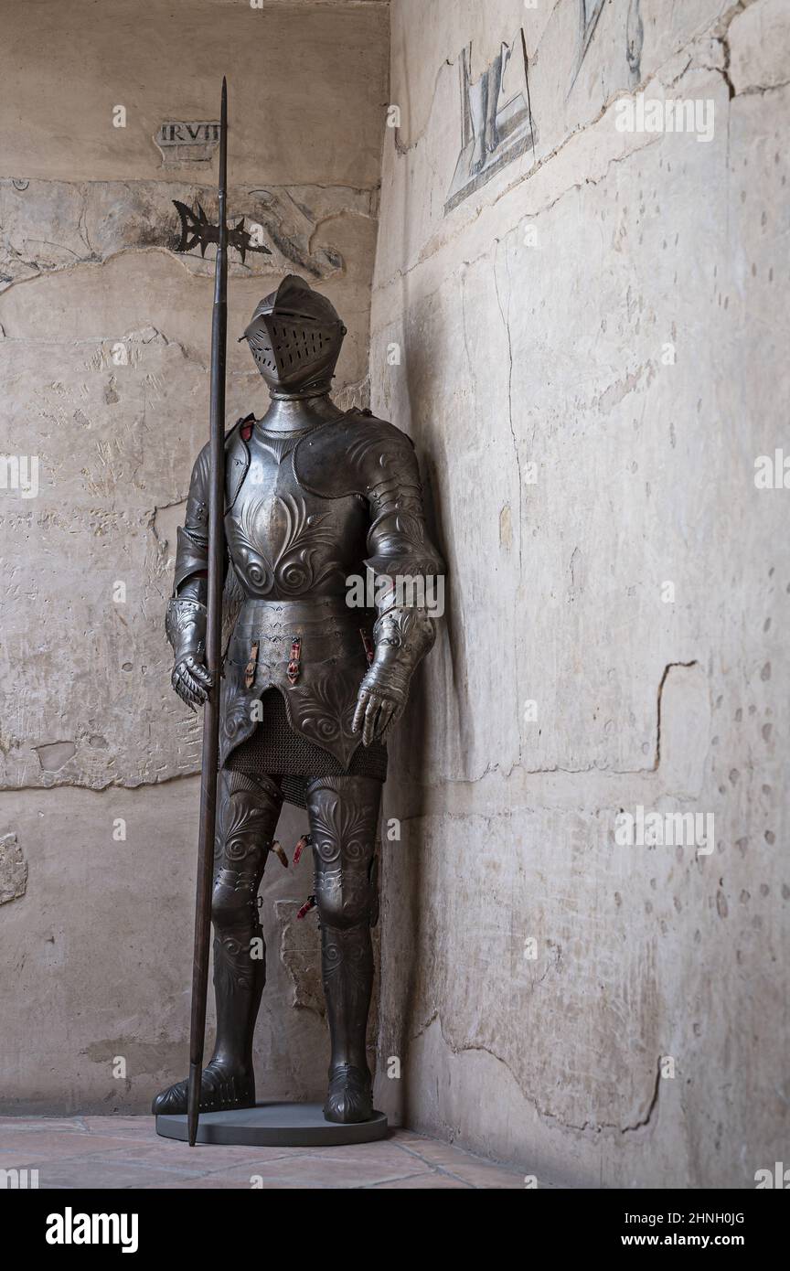Ancient medieval armor with a spear in the castle Stock Photo - Alamy