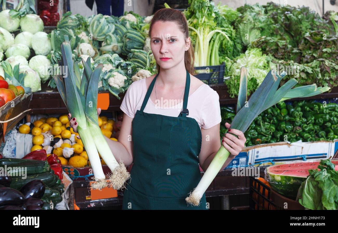 Young girl holding leek hi-res stock photography and images - Alamy