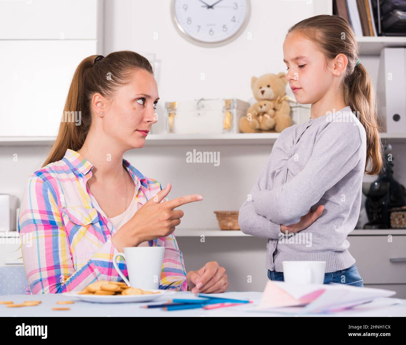 Young mother scolding her daughter Stock Photo - Alamy