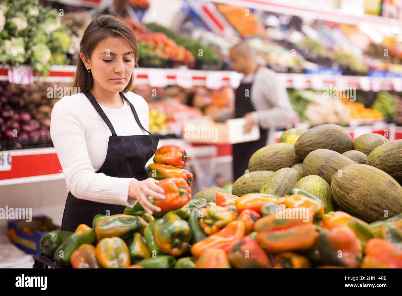 Female storekeeper supermarket employee hi-res stock photography and ...