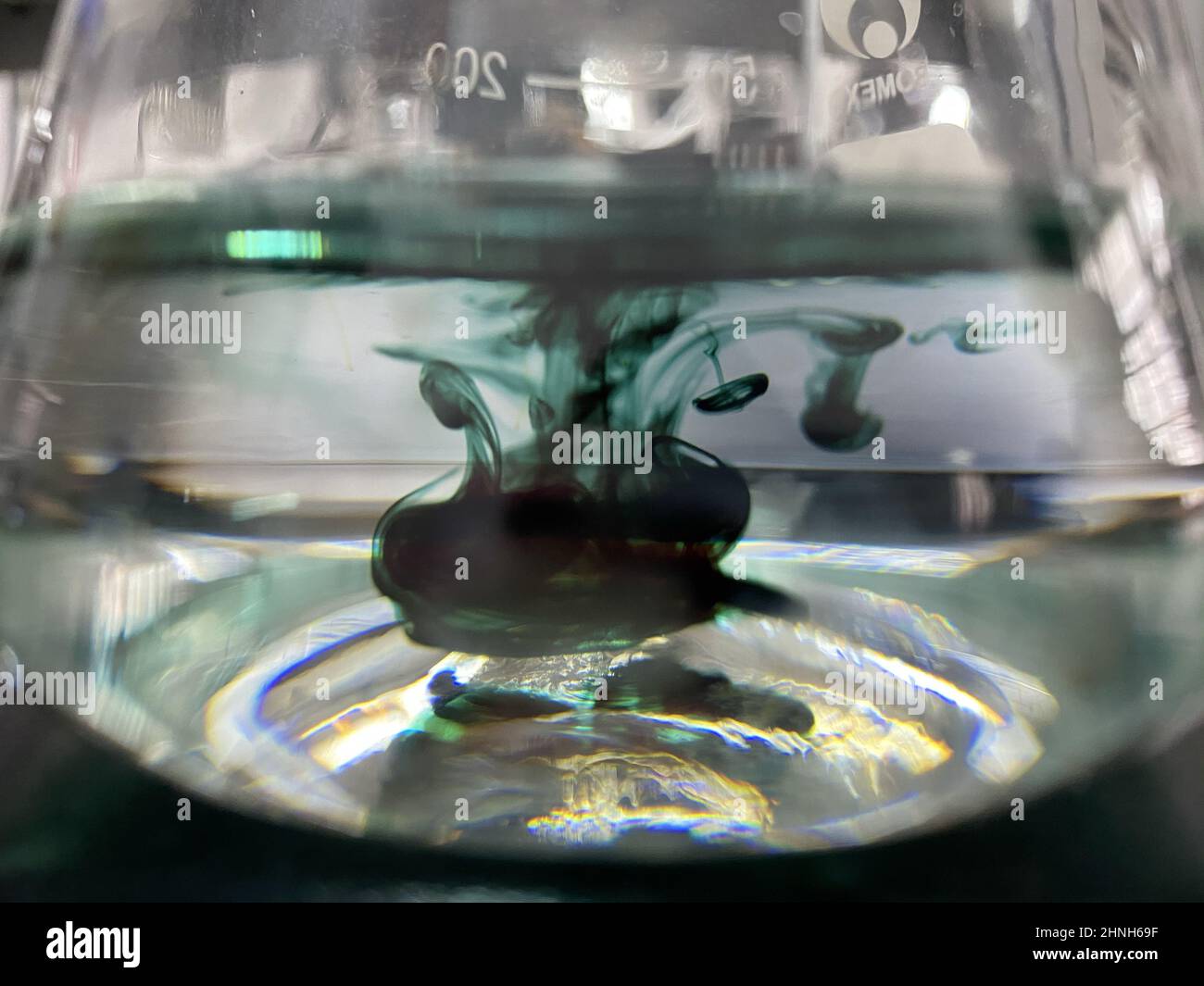 Background design with ink in a water Stock Photo - Alamy