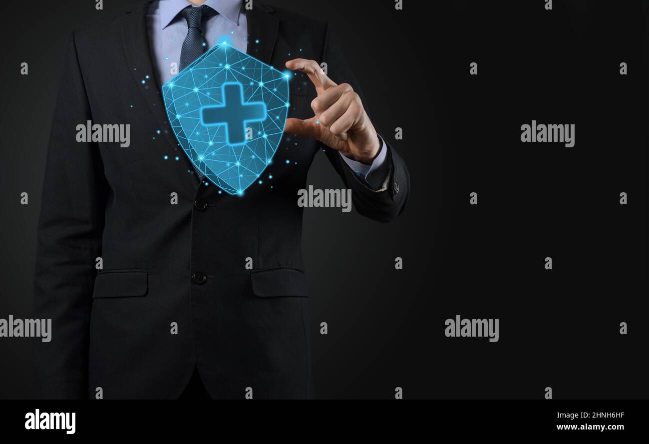 Businessman hold Shield with plus Low polygonal icon, medicine icon ...