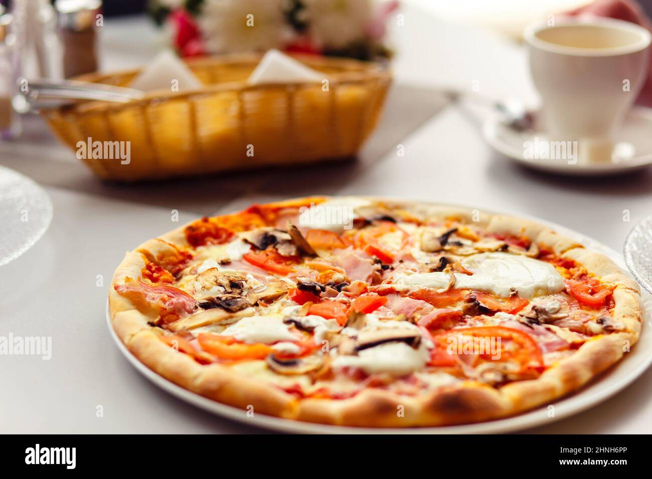 Pizza with Mozzarella Cheese, Fresh Tomato and Mushrooms. Served at ...
