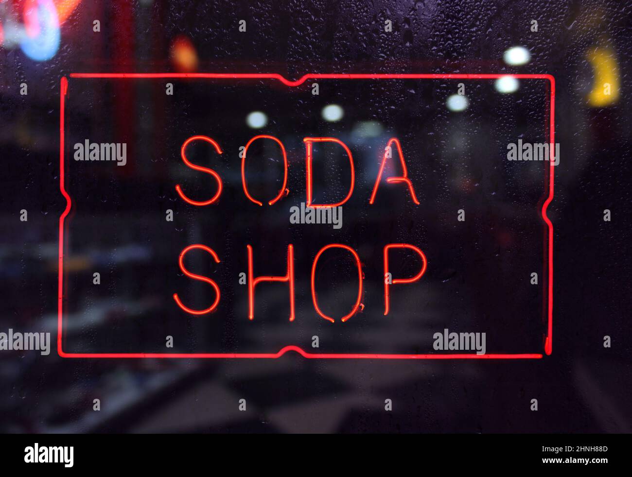 Vintage Neon Soda Shop Sign in Rainy Window Stock Photo - Alamy