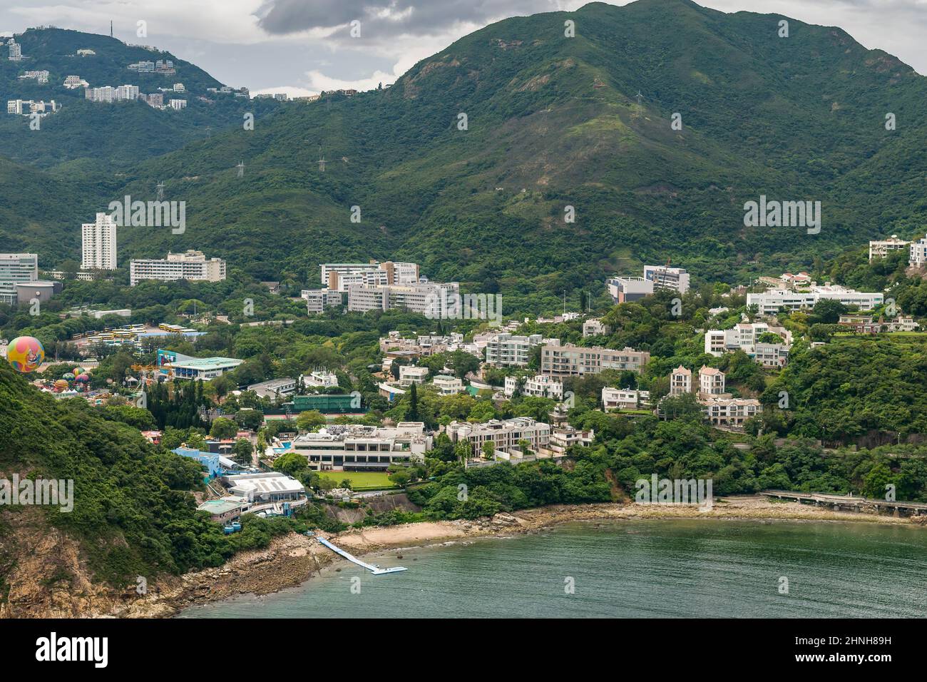 Aerial from helicopter showing Deep Water Bay and Shouson Hill, Hong ...
