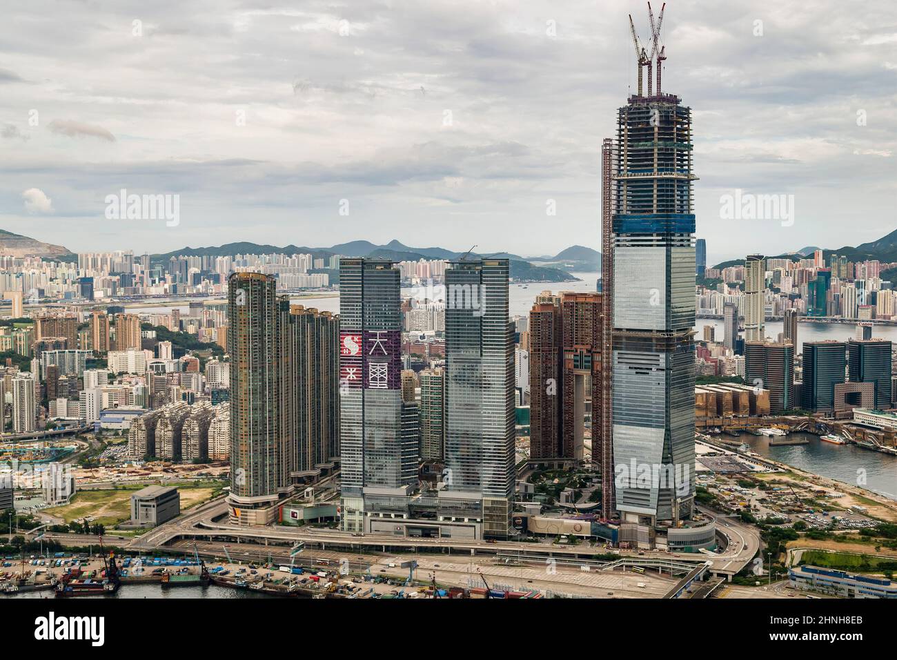 Aerial from helicopter showing Union Square, West Kowloon, Hong Kong ...