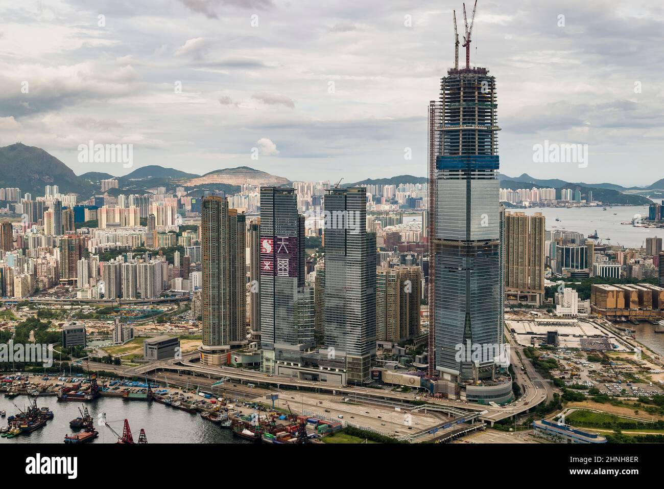 Aerial from helicopter showing Union Square, West Kowloon, Hong Kong ...